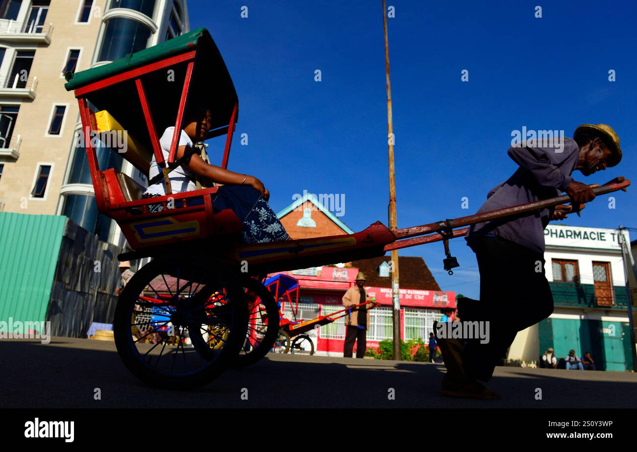 A pousse pousse in the streets of Antsirabe, Madagascar Stock Photo - Alamy