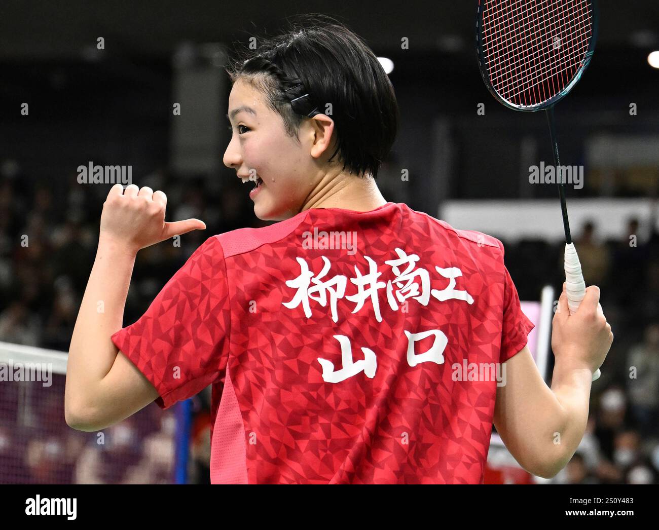 Tomoka MIYAZAKI, an 18-year-old high school student, indicates her high ...