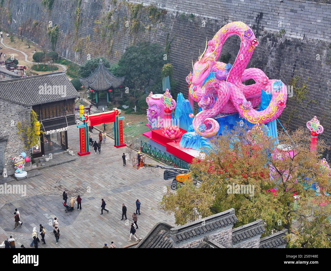 A giant festive lantern for the Year of the Snake is installed at the ...