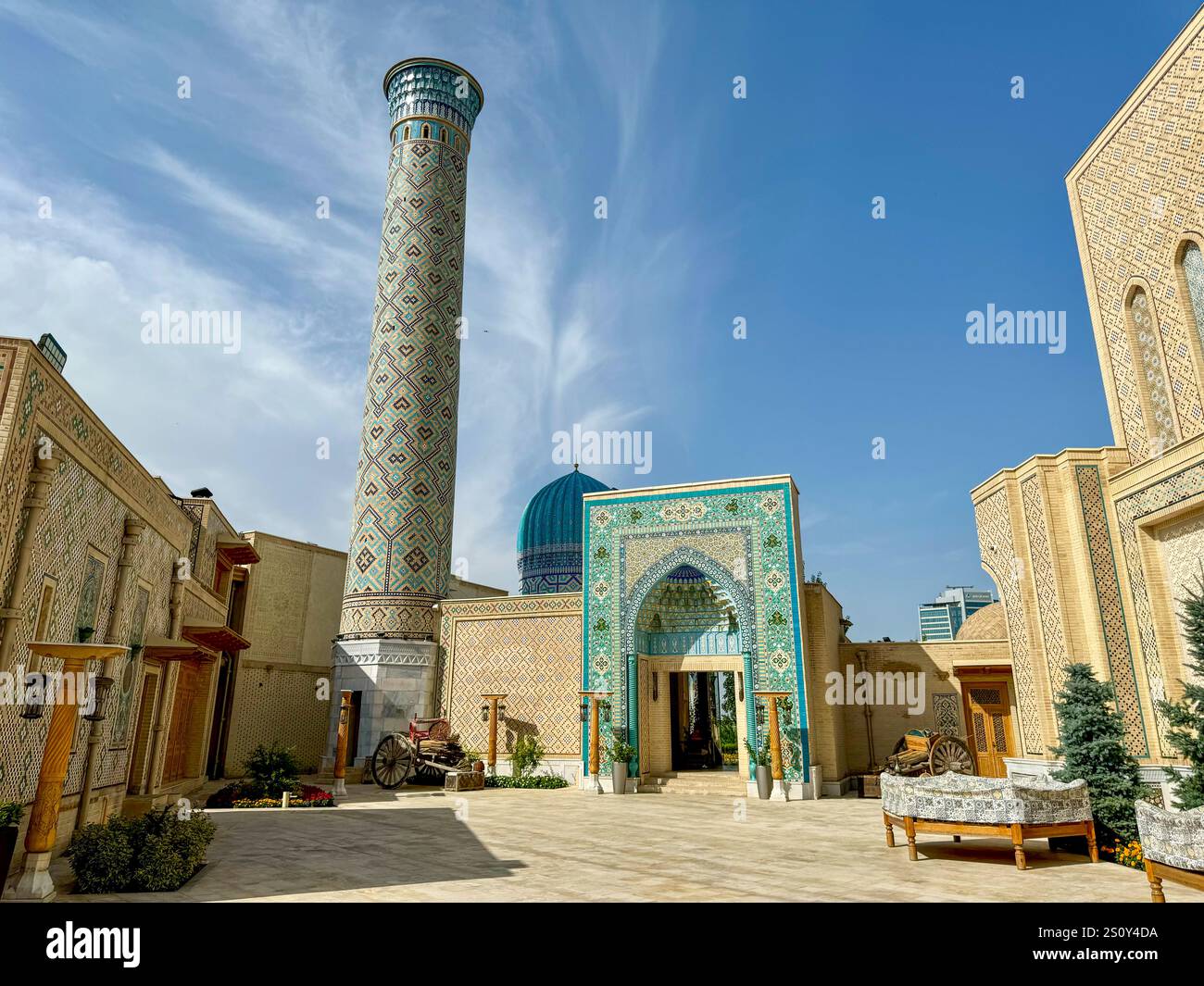 Elegant Minaret and Mosaic Arch in a Traditional Courtyard Setting ...