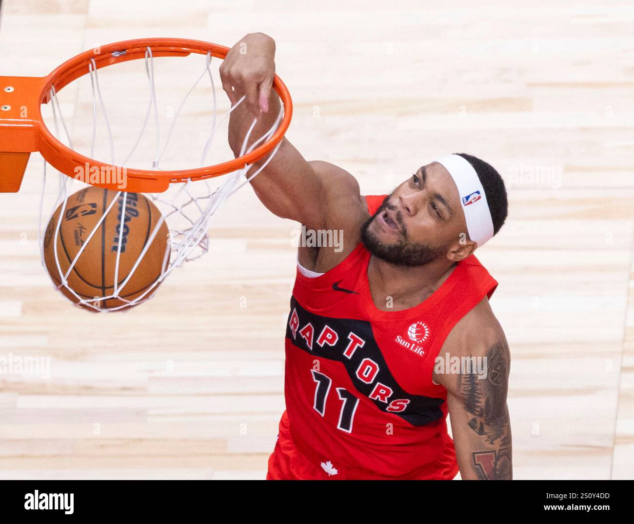 Toronto, Canada. 29th Dec, 2024. Bruce Brown Jr. of Toronto Raptors dunks during the 2024-2025 ...
