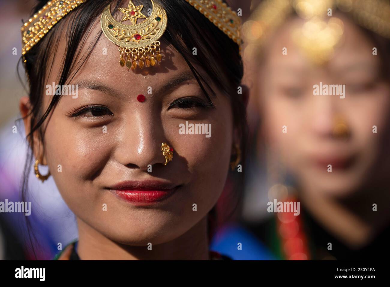 Nepalese Gurung community women in a traditional attire get ready to ...