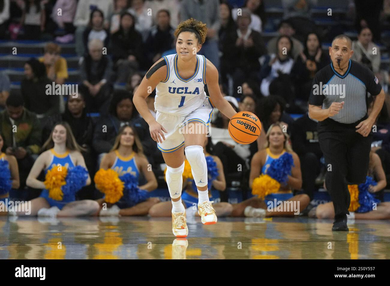 UCLA Bruins guard Kiki Rice (1) dribbles the ball against the Nebraska ...