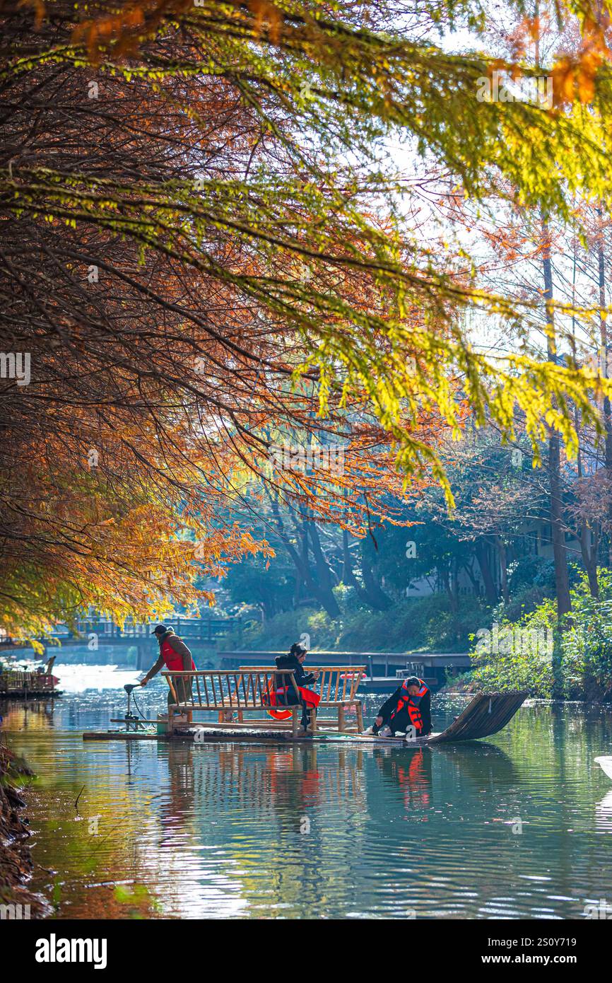 Tourists admire winter scenery of a wetland park in Suzhou City, east ...