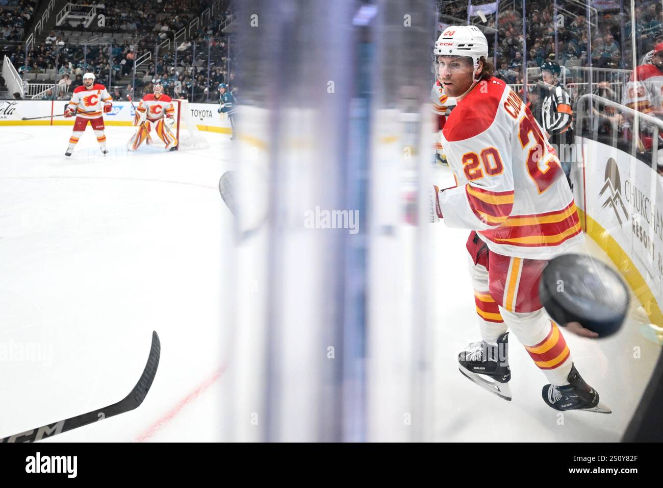 Calgary Flames center Blake Coleman (20) keeps an eye on the puck ...