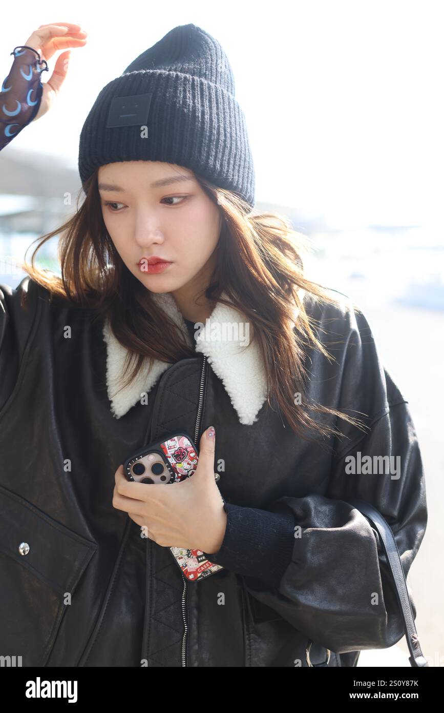 Chinese singer, dancer and actress Cheng Xiao appears at the airport in ...