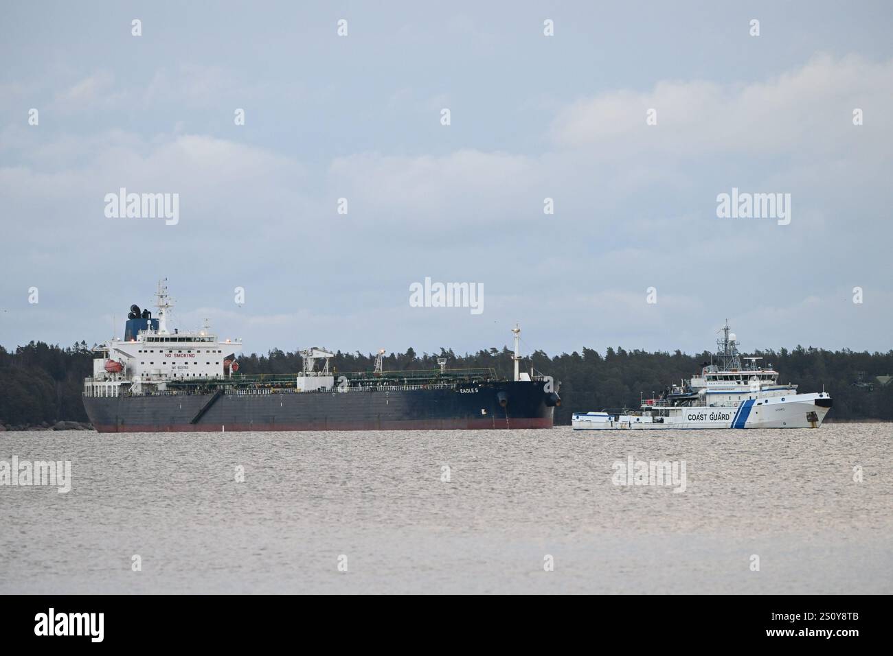 Porvoo, Finland. 30th Dec, 2024. Finnish Coast Guard Uisko keeps watch ...