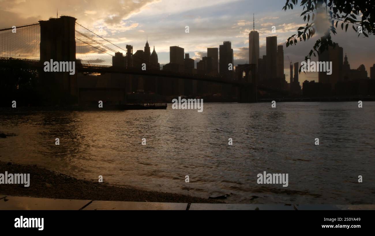 Brooklyn Bridge, rainy foggy day. New York City Manhattan downtown ...