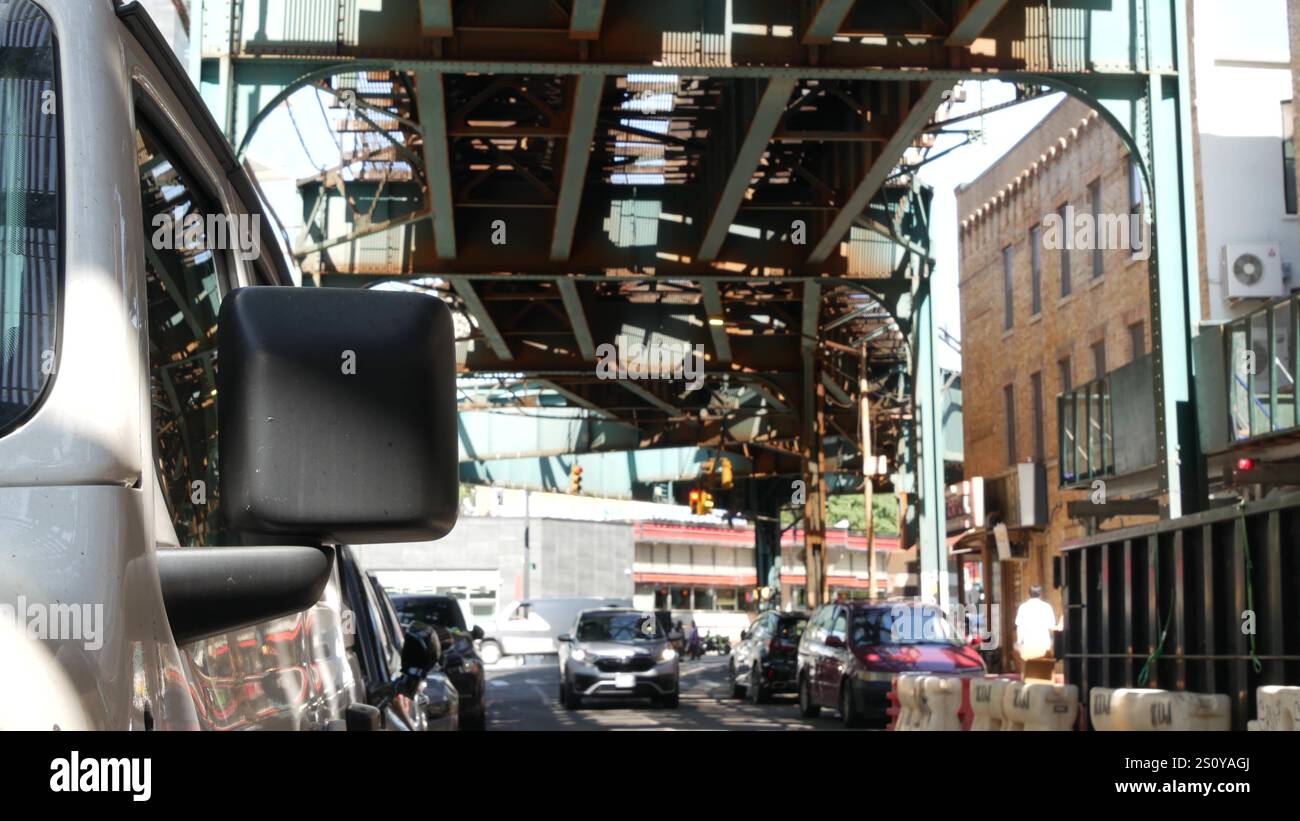 Elevated subway above New York city street. Metropolitan bridge over ...