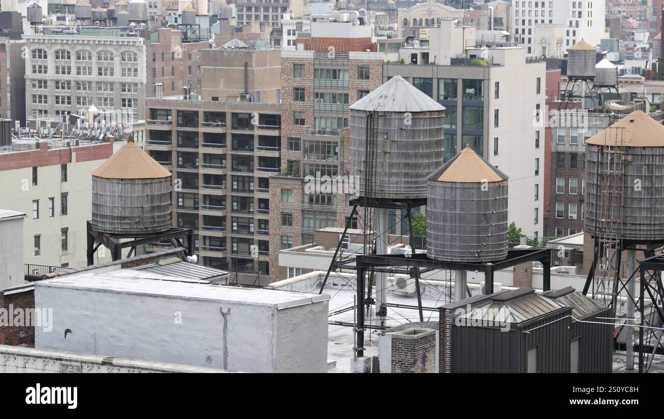 New York City Manhattan cityscape. Rooftop water towers from view point ...