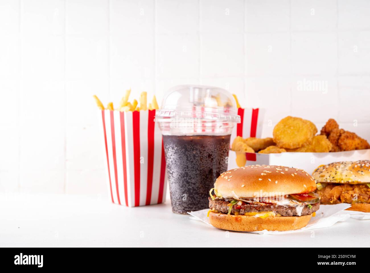 Fast food delivery menu background with various burgers, cheeseburger, nuggets, french fries ...