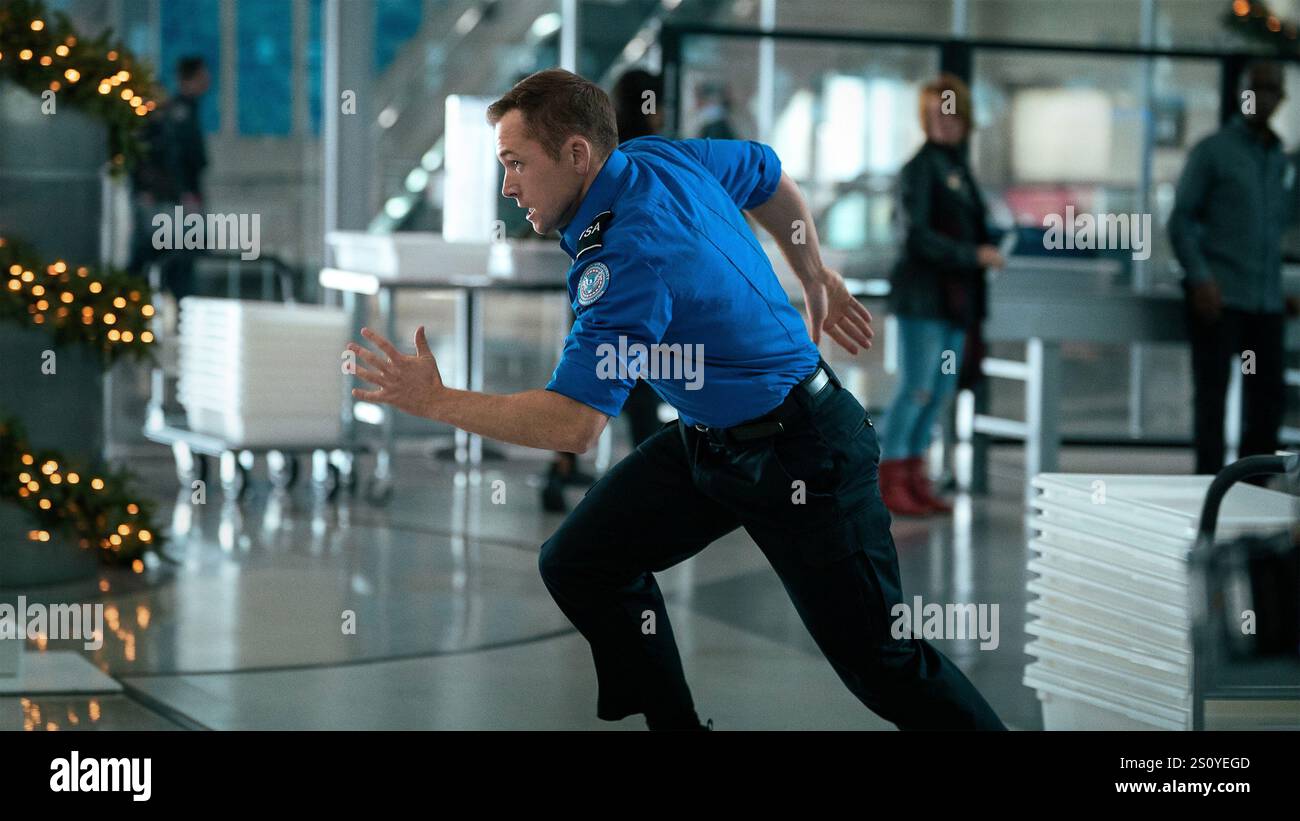 TARON EGERTON in CARRY-ON (2024), directed by JAUME COLLET-SERRA ...