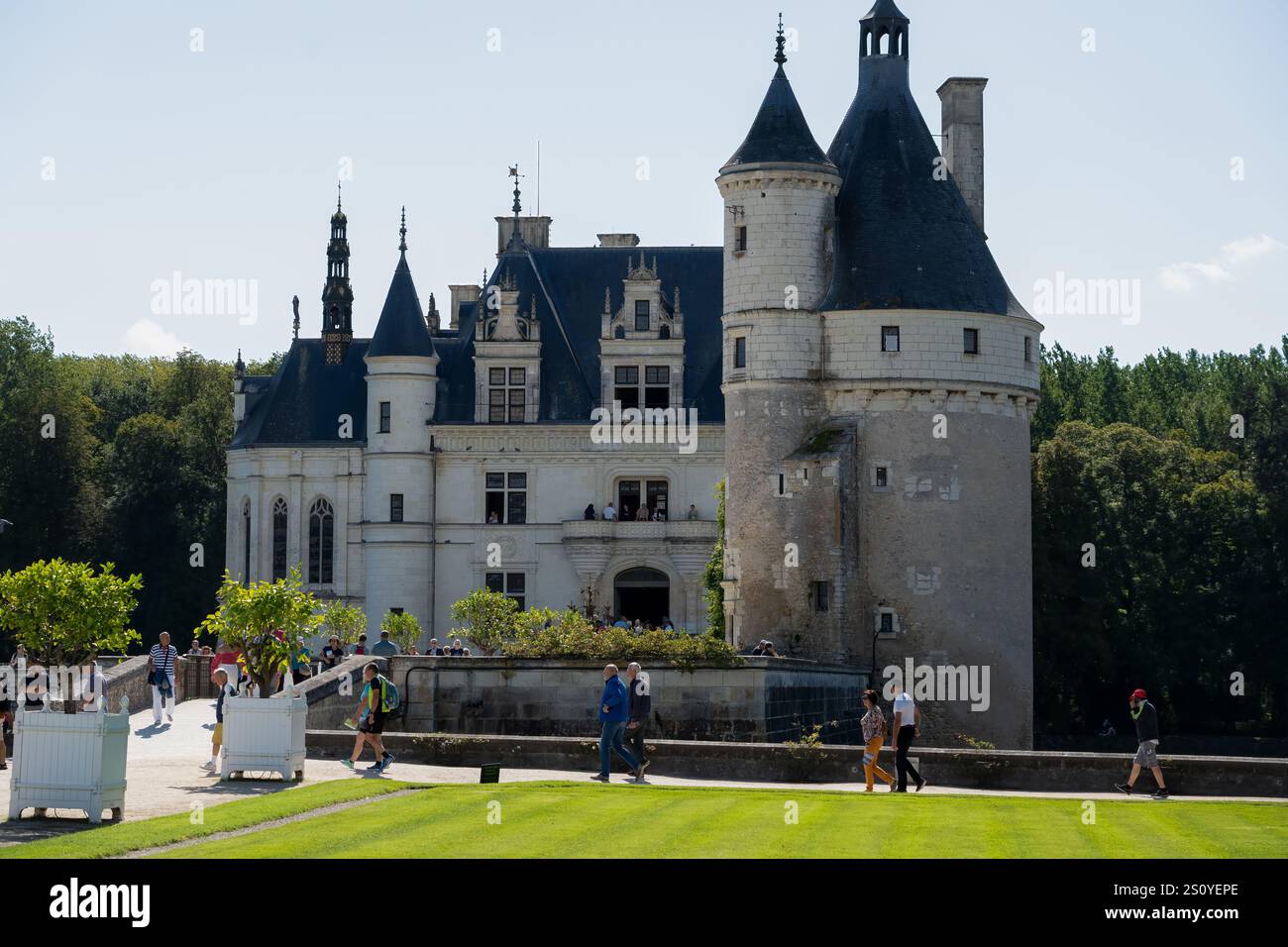 a magnificent white French chateau built on the river Cher, near ...