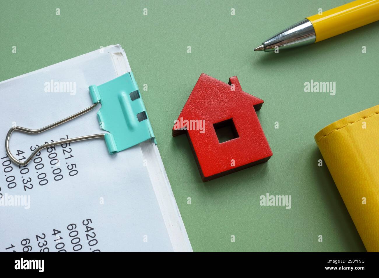 House model and financial calculations. Mortgage planning Stock Photo ...