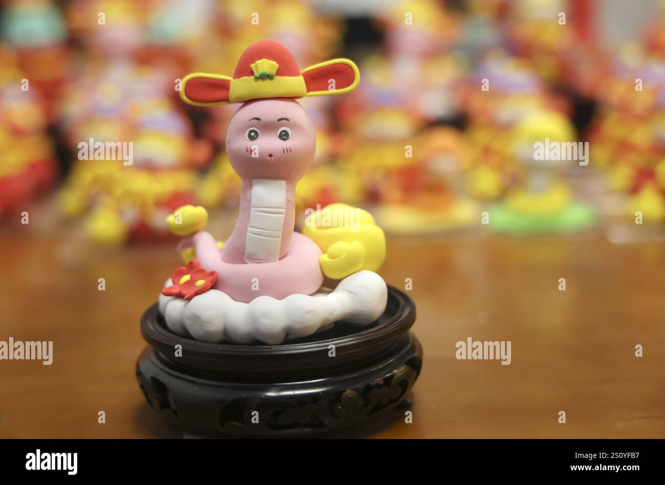 People make snake dough modellings in Linyi City, east China's Shandong ...