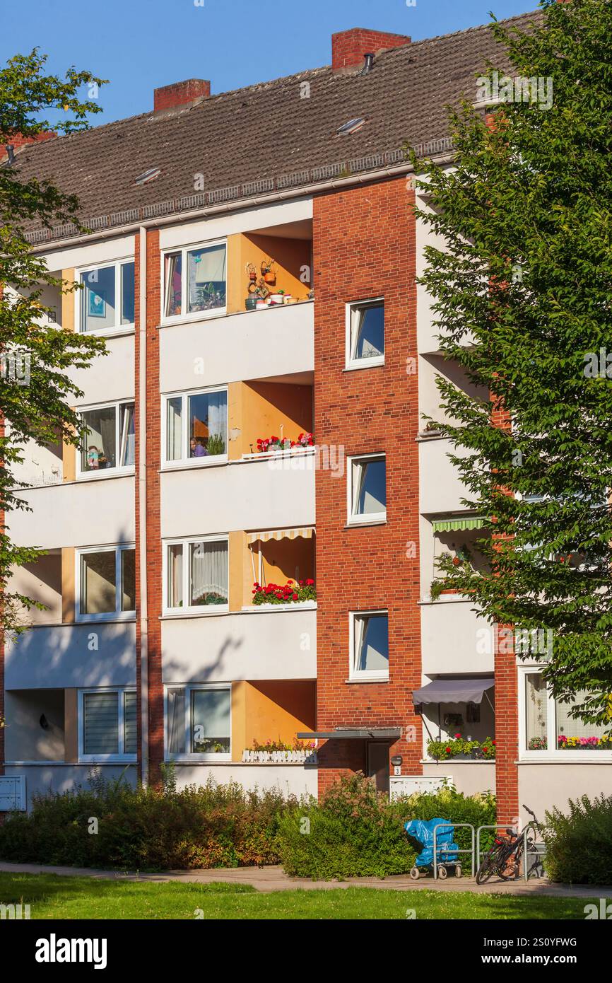 Monotonous modern brick residential building with balconies, multi ...