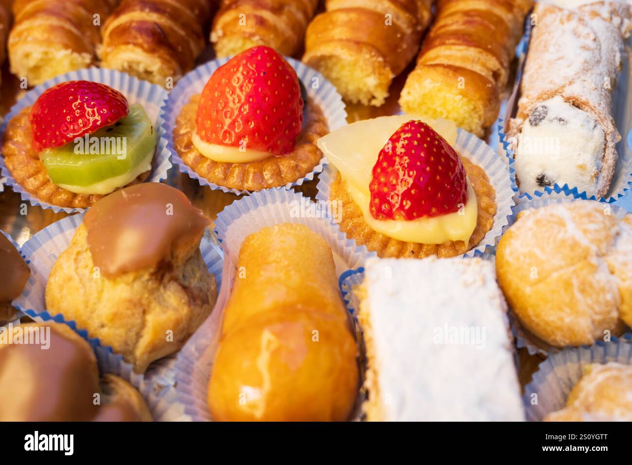 Beautiful typical Italian pastries mix in a tray Stock Photo - Alamy