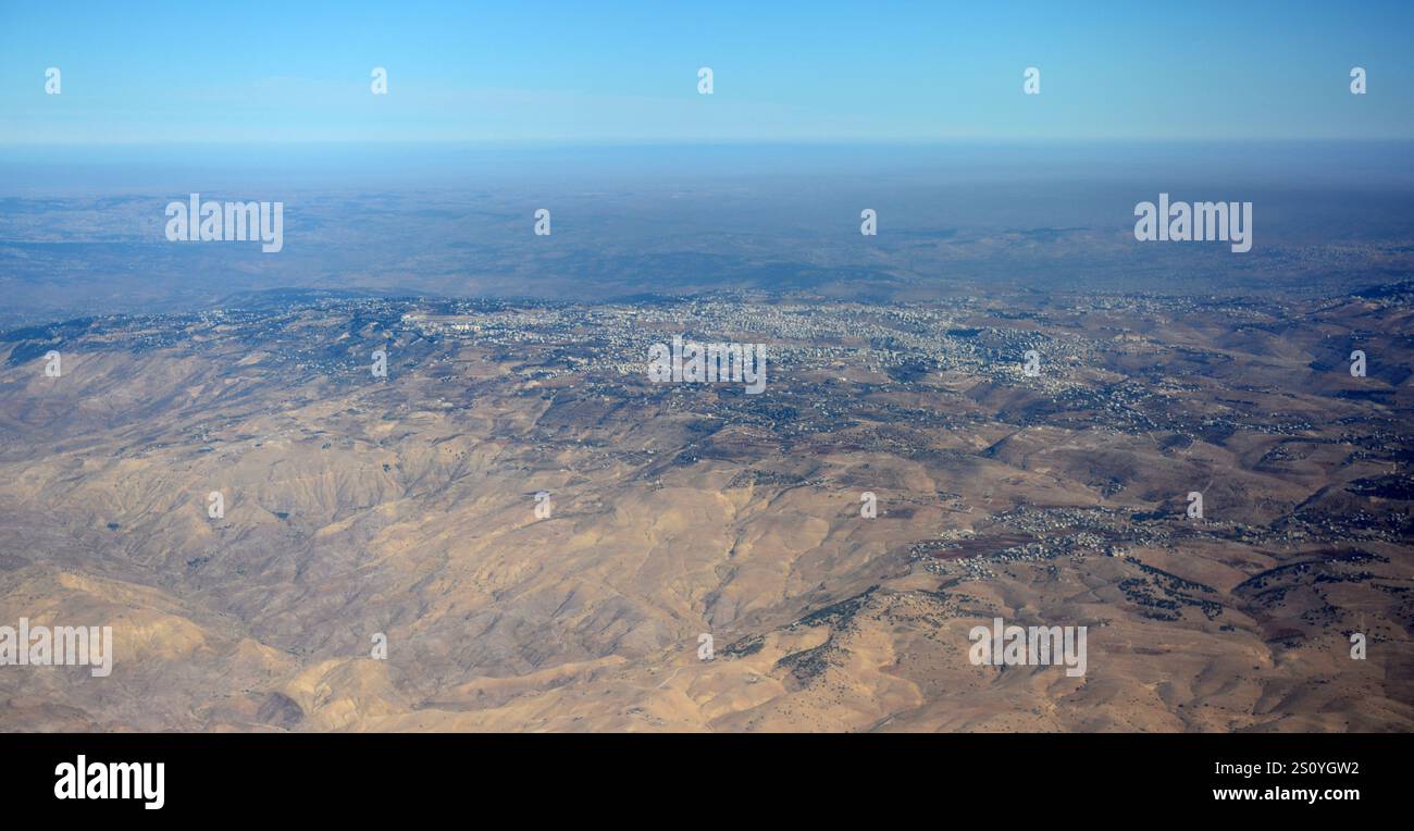 Aerial view of the Jordanian Highlands and the desert discending to the ...