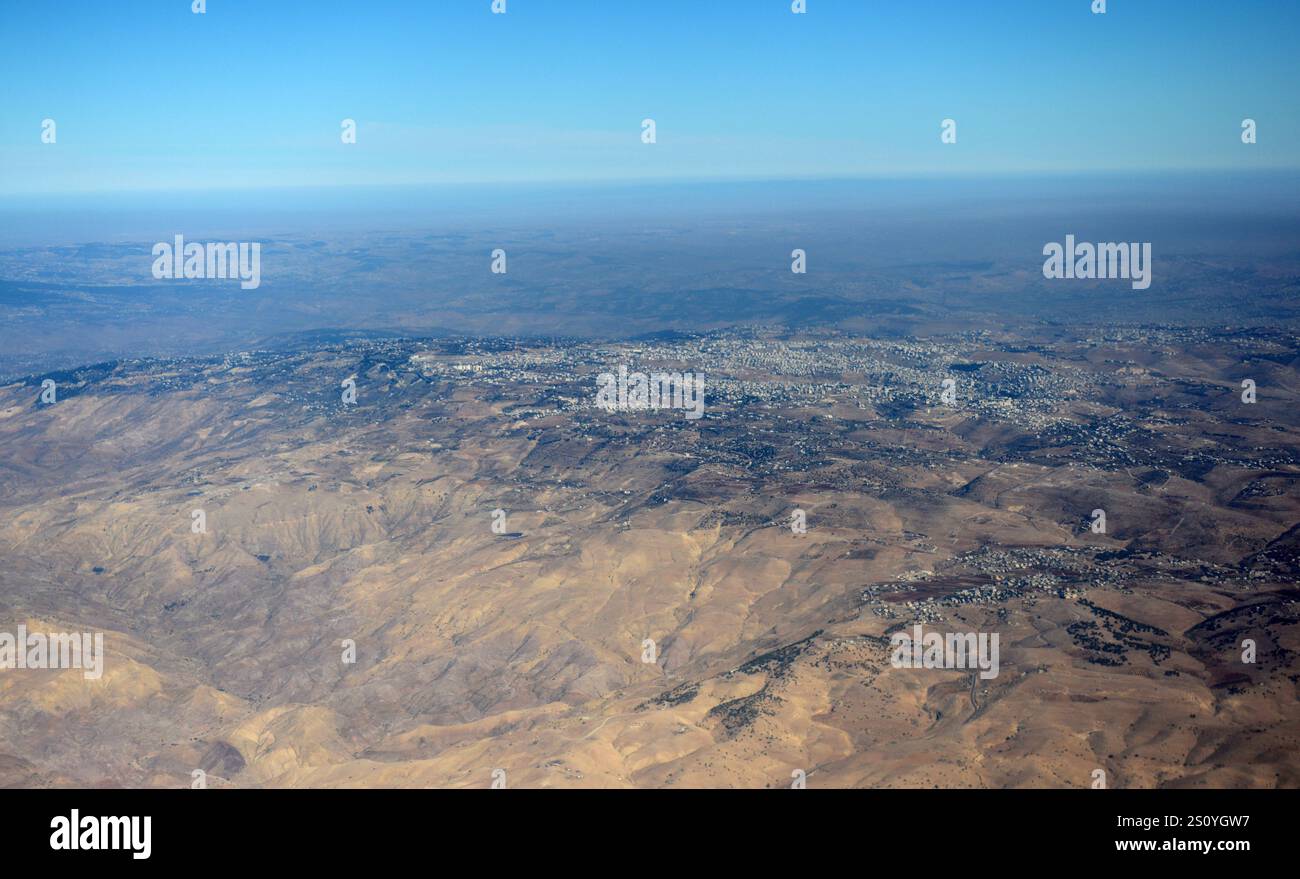 Aerial view of the Jordanian Highlands and the desert discending to the ...