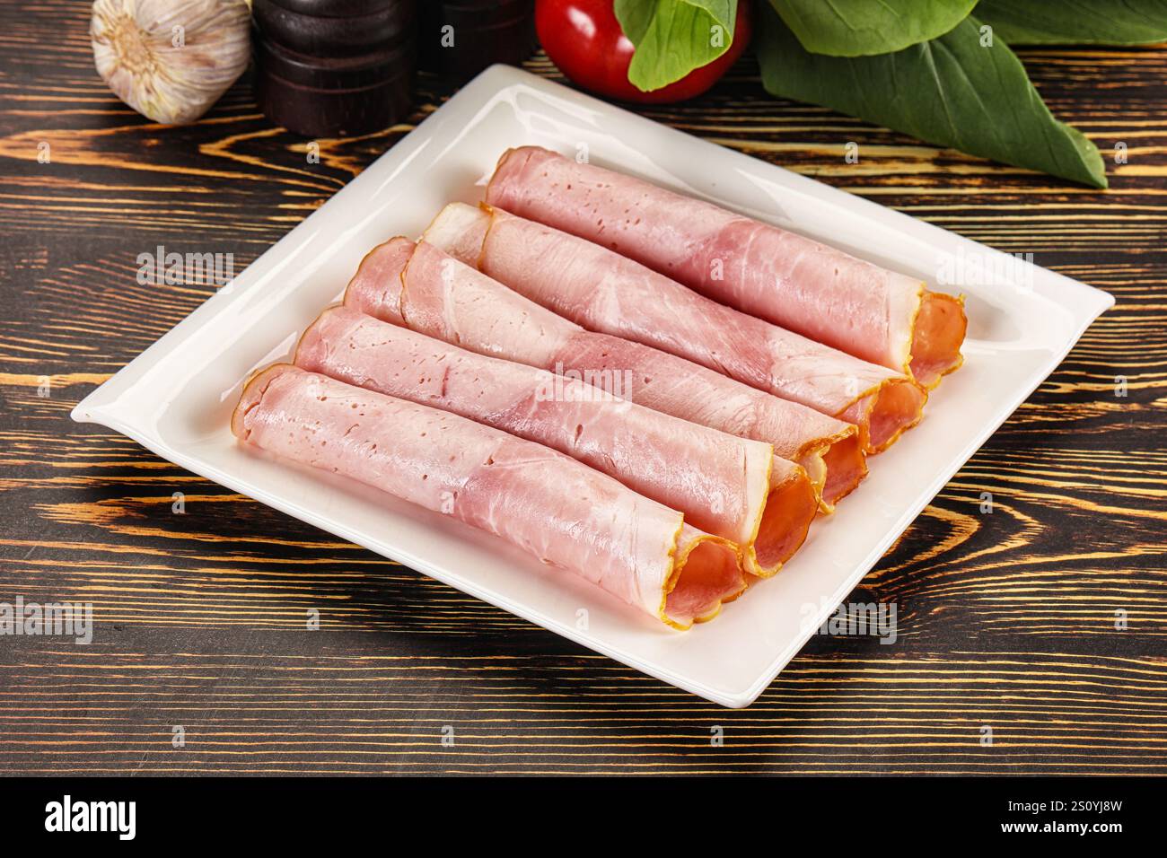 Italian sausage Prosciutto cotto ham appetizer Stock Photo - Alamy