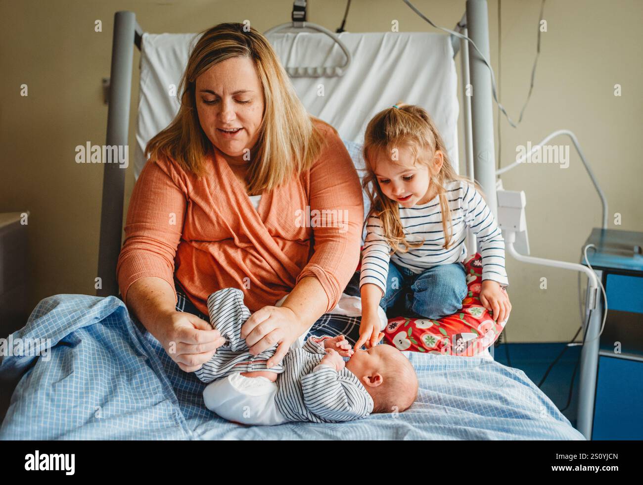 Small girl changing clothes hi-res stock photography and images - Alamy