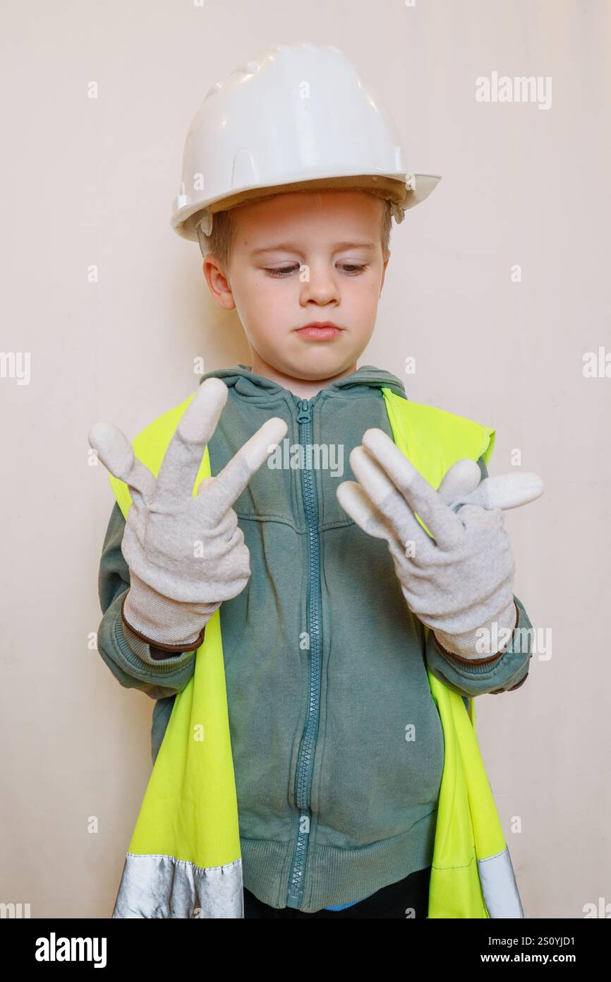 Young engineer in a construction uniform Stock Photo - Alamy
