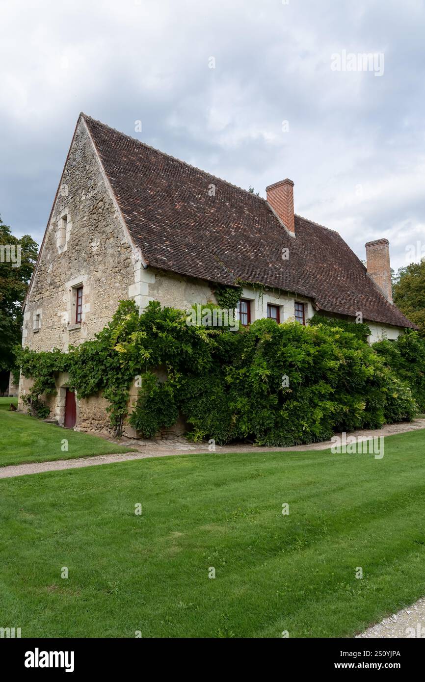 Old Traditional French House covered with common ivy (Hedera Helix ...