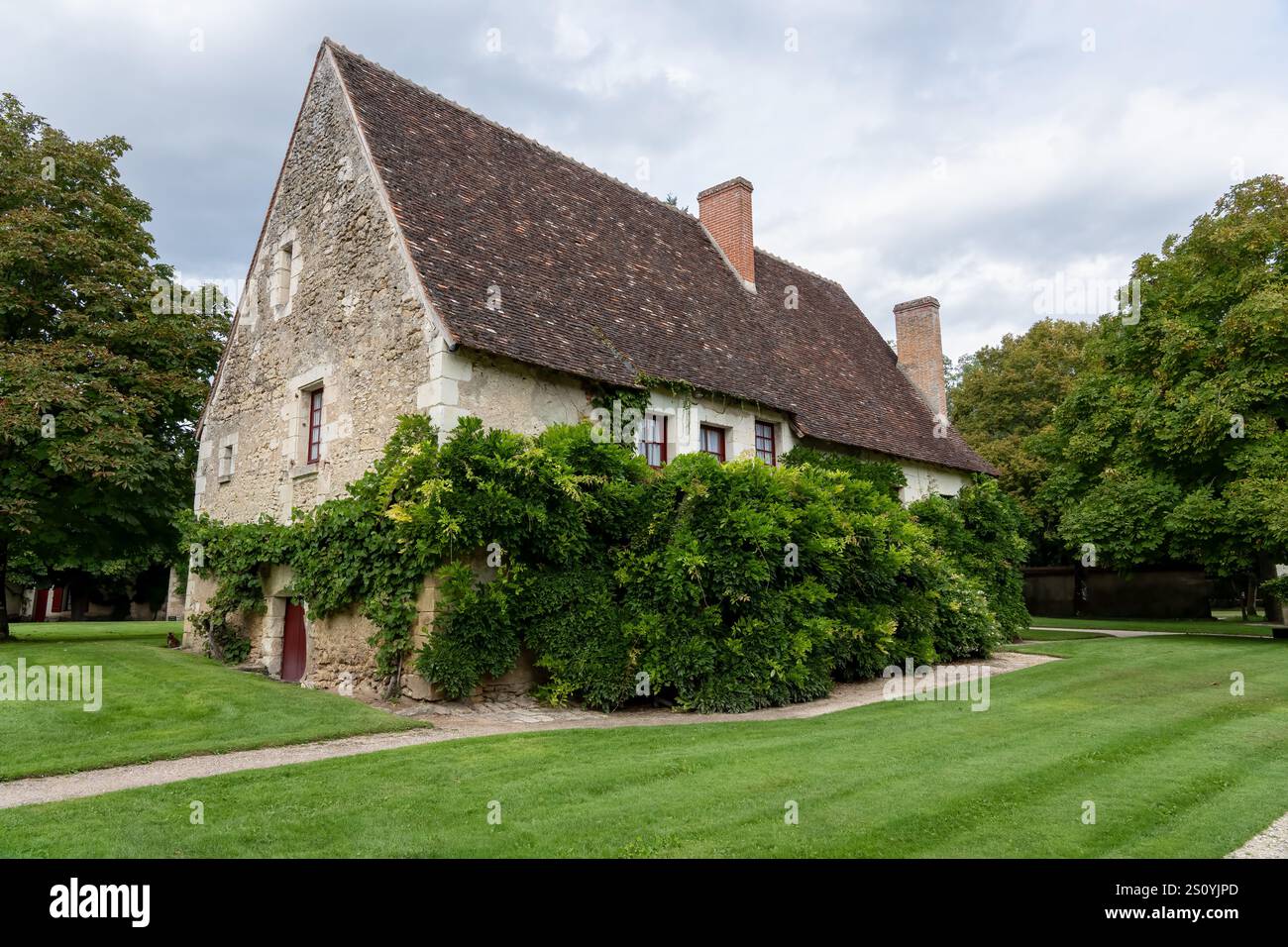 Old Traditional French House covered with common ivy (Hedera Helix ...
