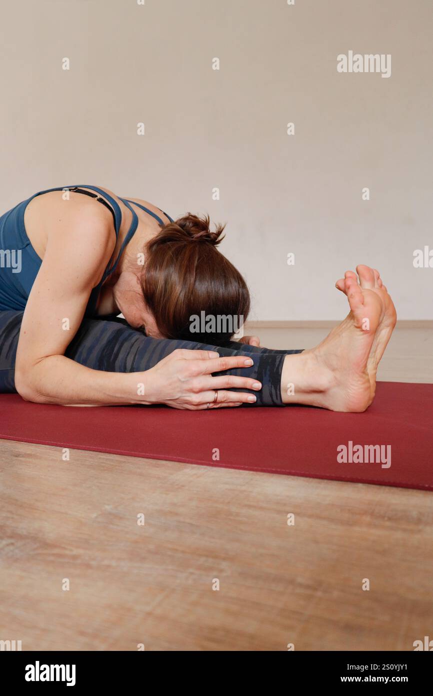 Yoga poses showcasing strength and flexibility Stock Photo - Alamy