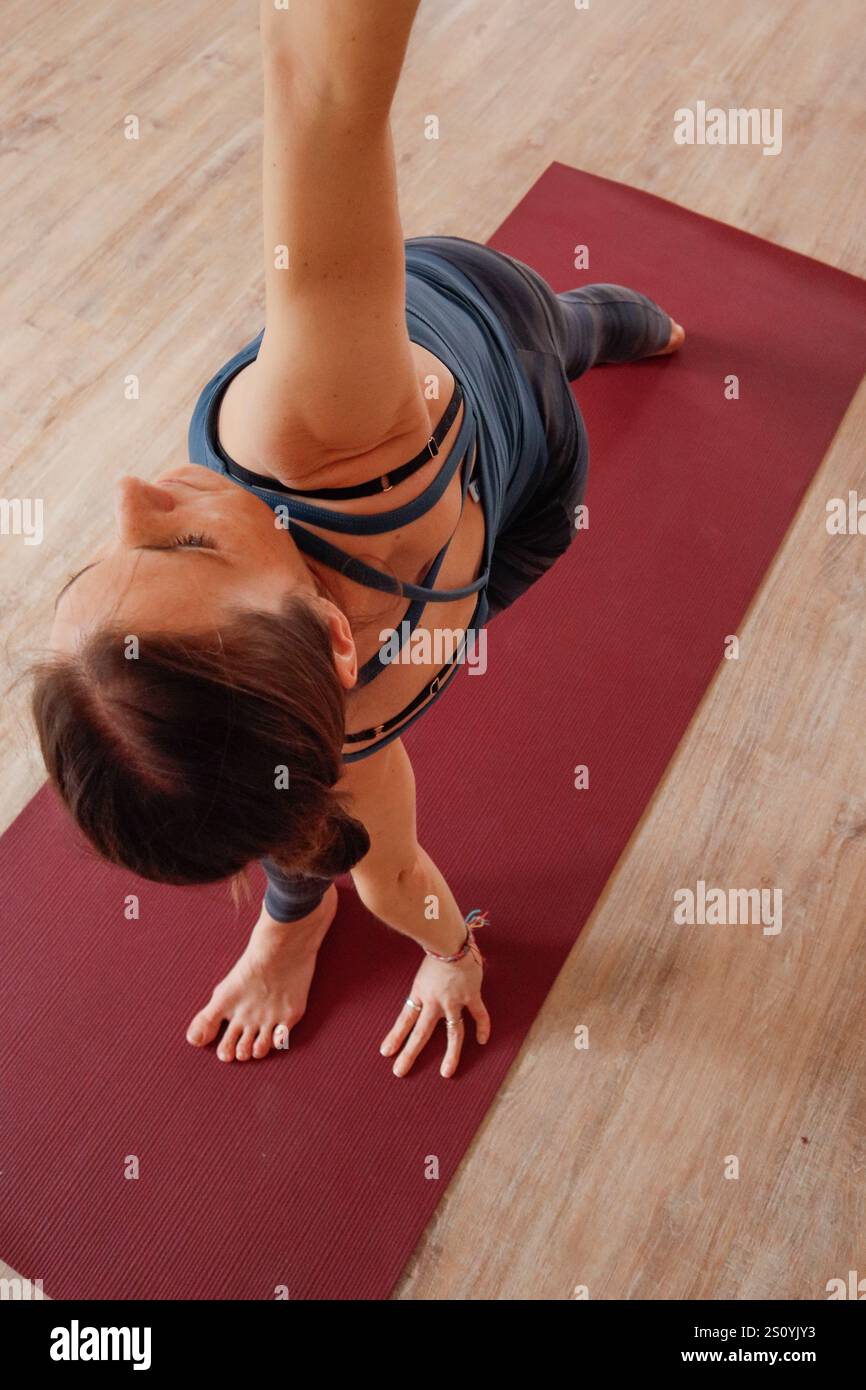 Calm and strength: yoga on a mat Stock Photo - Alamy