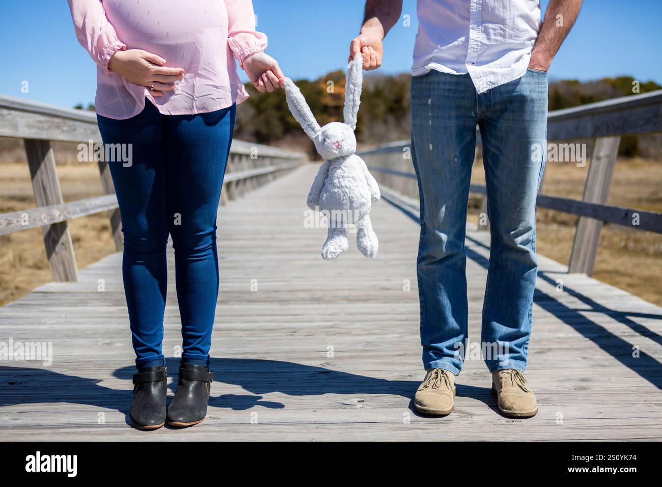 Soon to be parents hold future daughters stuffed bunny by the ea Stock ...