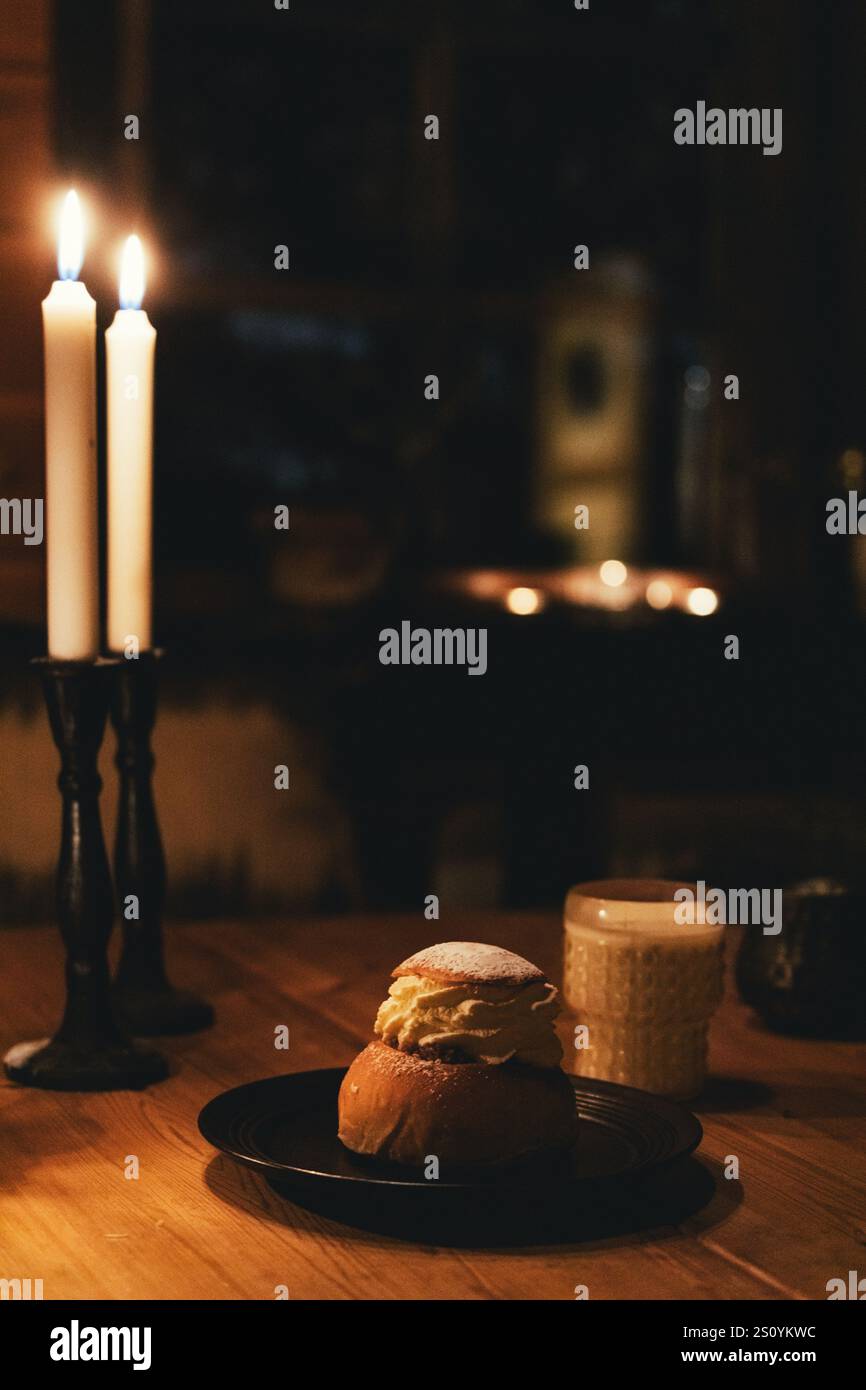 Swedish Semla with Milk by Candlelight Stock Photo - Alamy