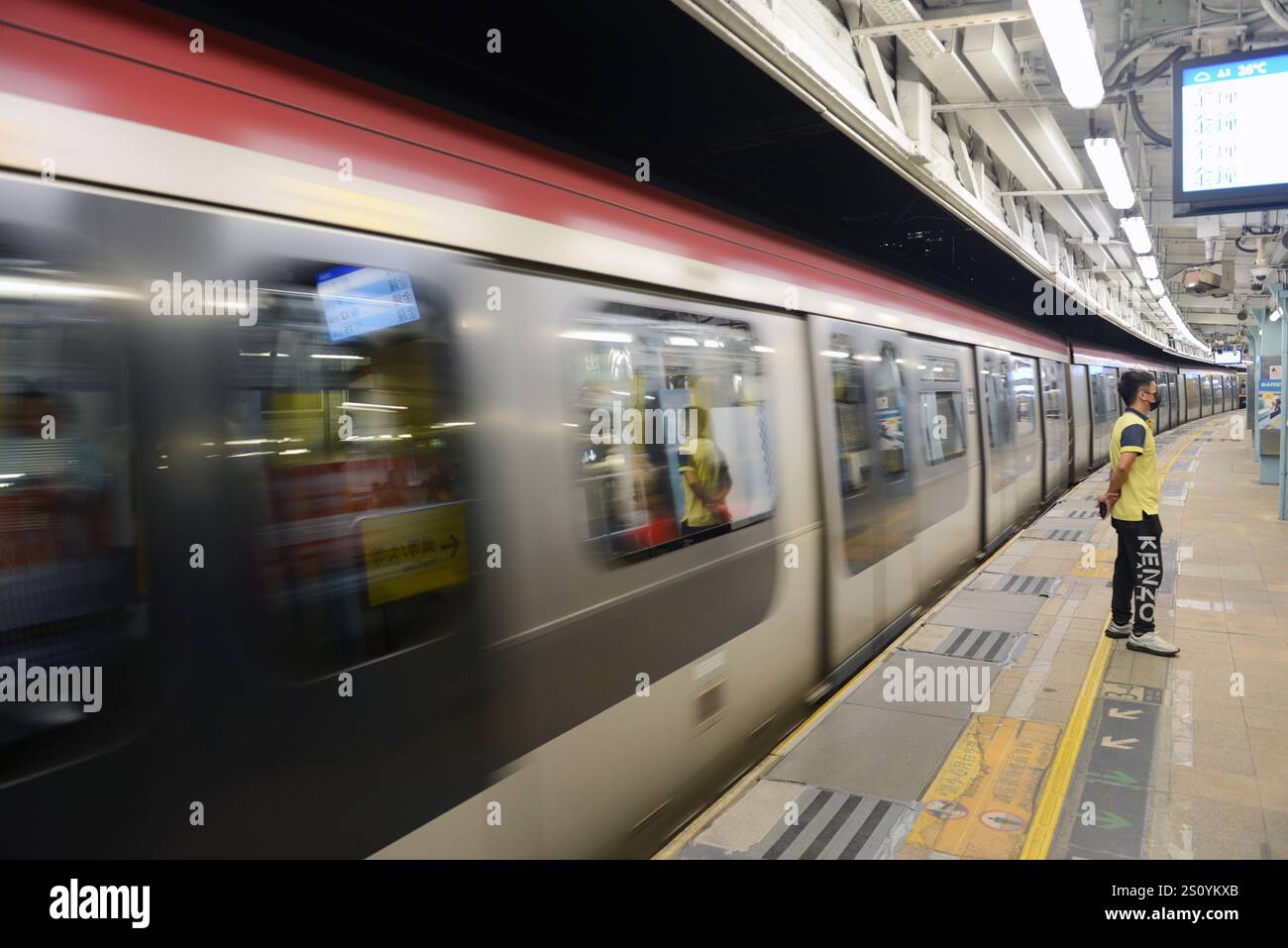 Passengers waiting for the MTR East Rail line at University station in ...