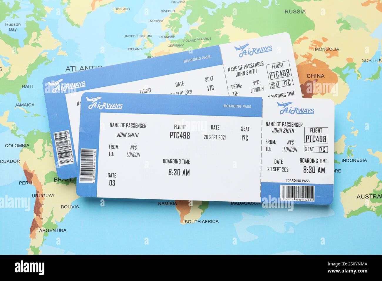Travel agency. Flight tickets on world map, top view Stock Photo - Alamy