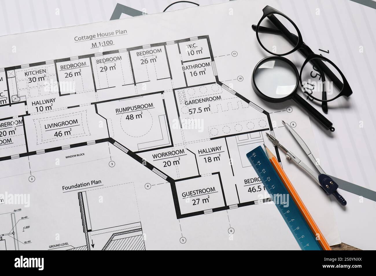 Pencil, dividers, ruler, glasses and magnifying glass on different ...