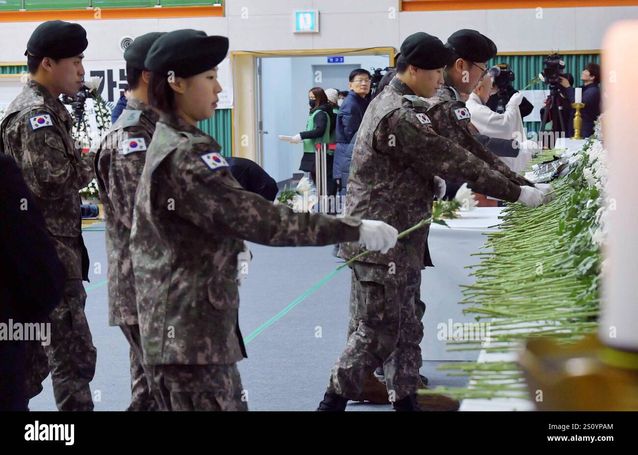Plane fire in Muan, South Korea South Korean soldiers pay tribute at a ...