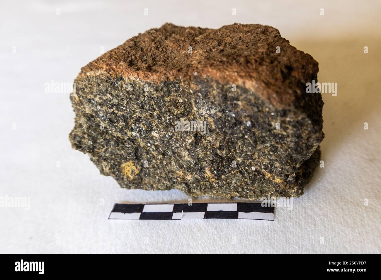 A sample of a type of peridotite called harzburgite, composed of ...