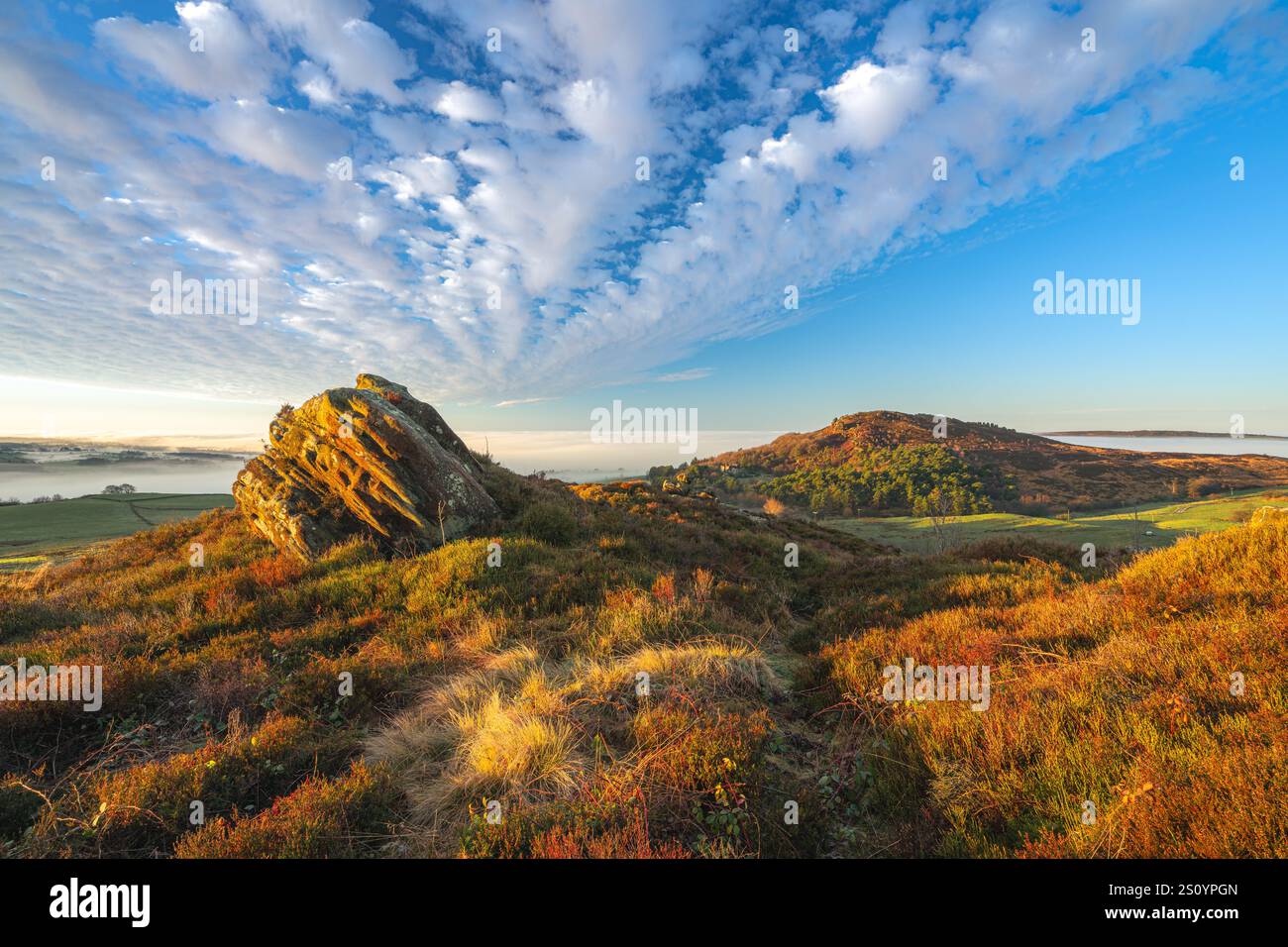 A view of Hen Cloud during a winter sunrise with a cloud inversion in ...