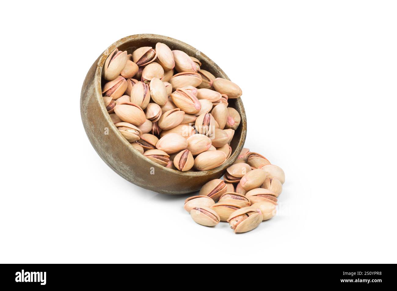 Pistachio nut in nutshell isolated on white background in bowl ...