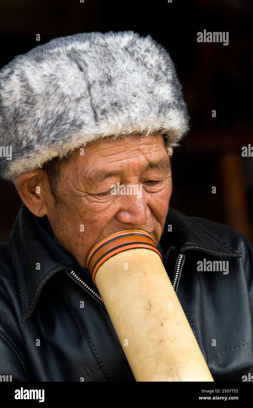 Afternoon smoke with a traditional Bamboo pipe. Photo taken at the ...