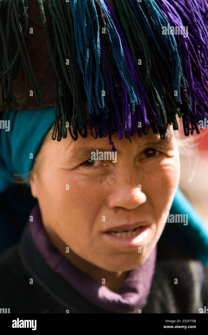 Portrait of an elderly Hani woman taken in southern Yunnan province ...