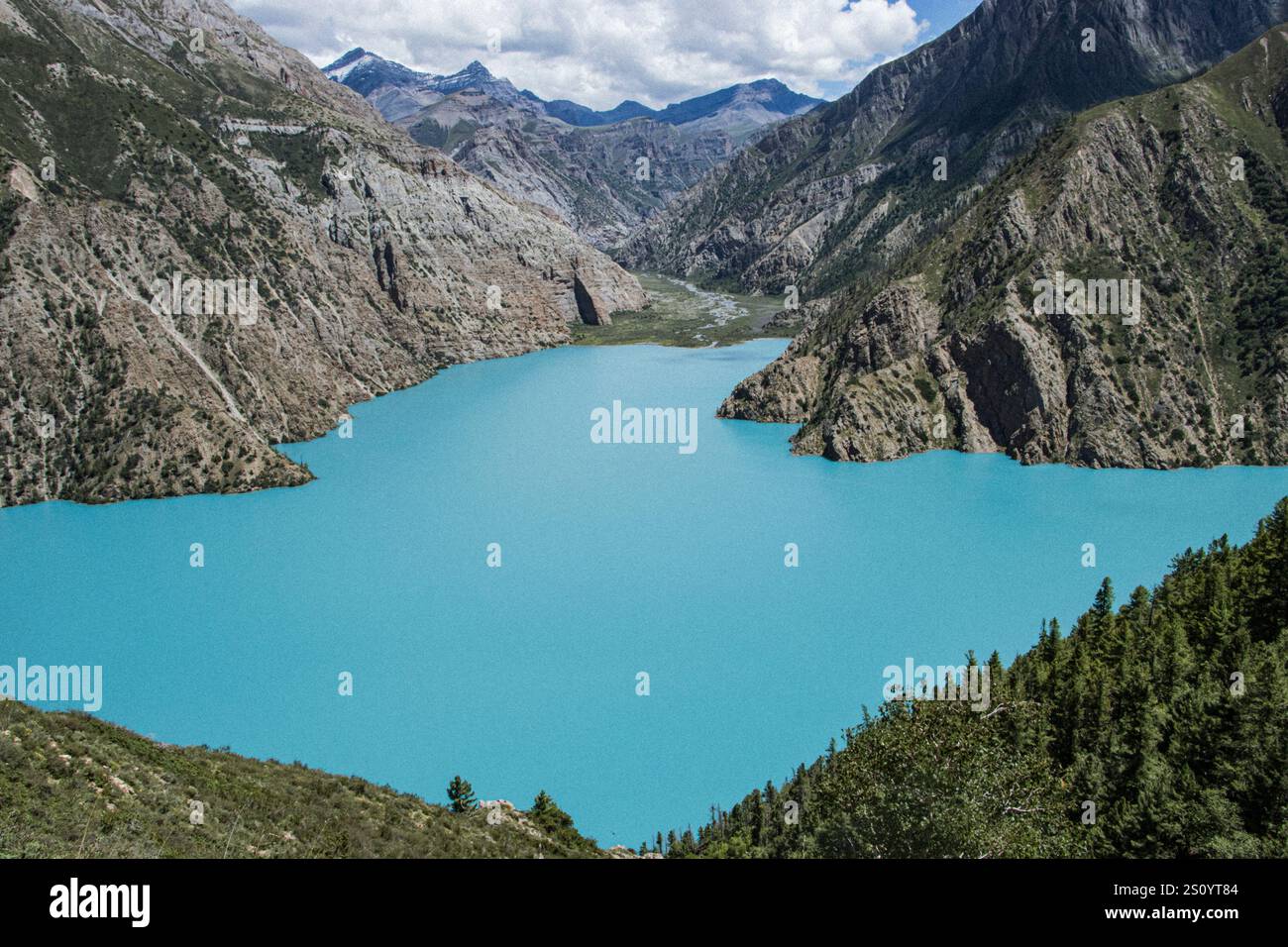 Shey Phoksundo Lake, located in the Ringmo Village is a stunning alpine ...