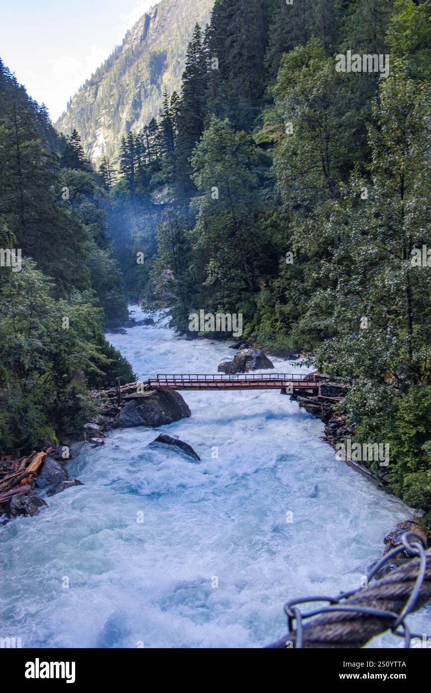 A traditional wooden bridge over the Bheri River in Dolpa, Nepal Stock ...