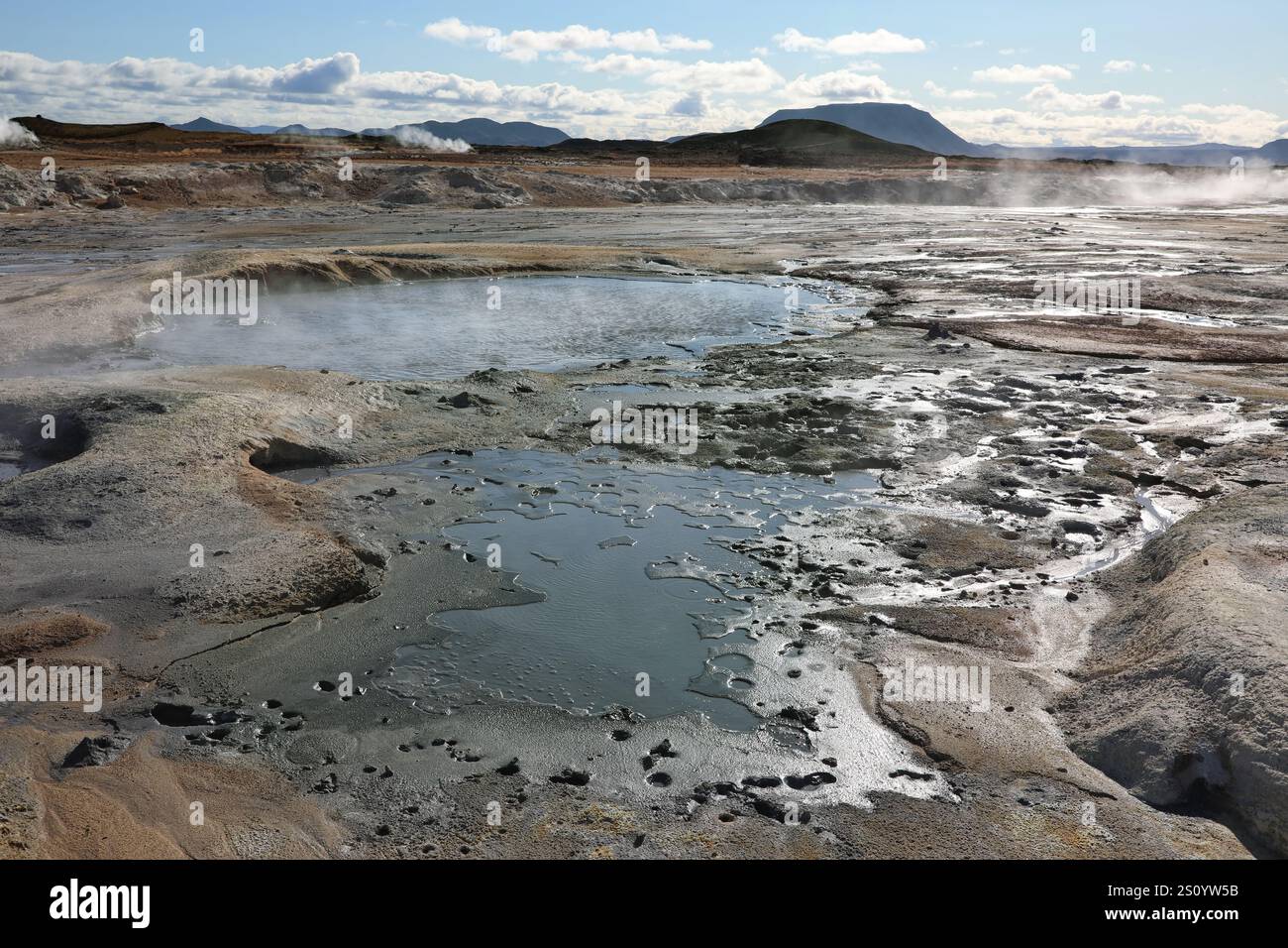Boiling mud pots surrounded by sulfur hot springs in Hverir Namafjall ...