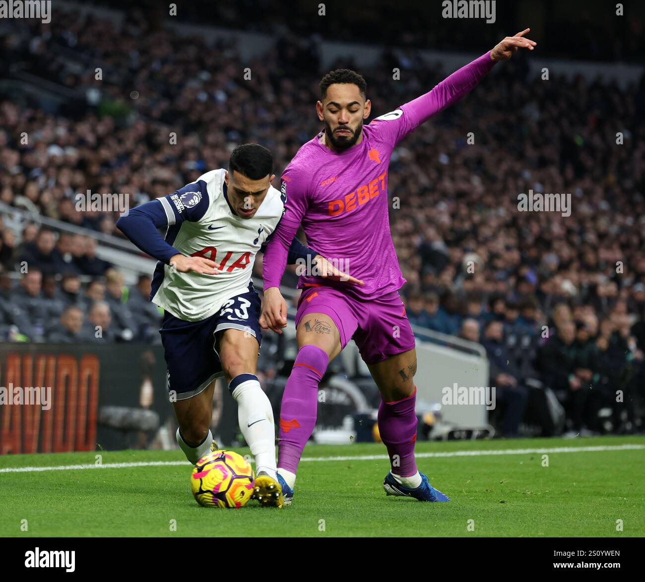 London, UK. 29th Dec, 2024. Pedro Porro of Tottenham with Matheus Cunha ...