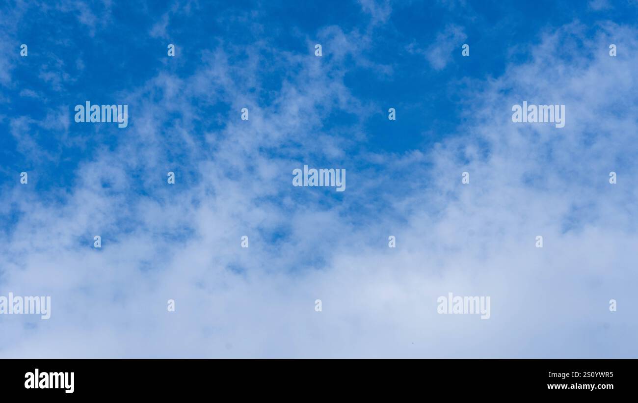 Time lapse of cumulus clouds moving in a blue sky. Beautiful blue sky ...