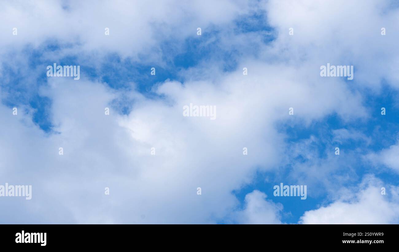 Time lapse of cumulus clouds moving in a blue sky. Beautiful blue sky ...