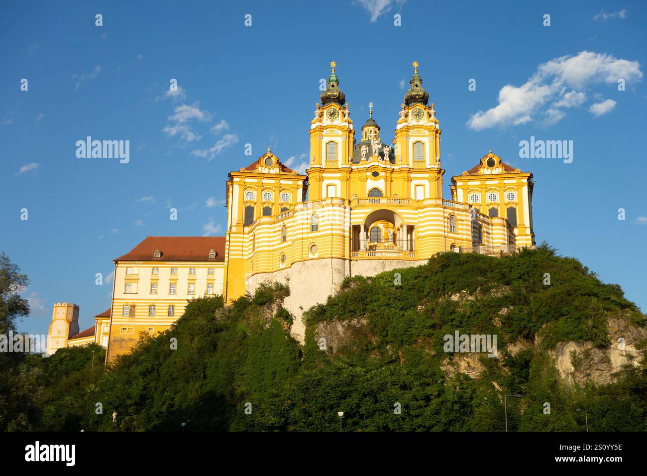 Melk Abbey castle in Austria, huge orange baroque building on bedrock ...