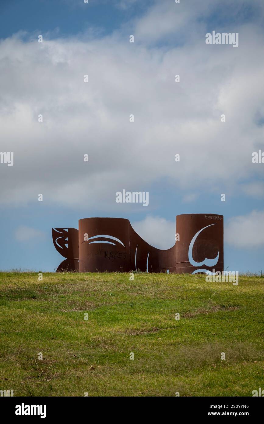 The Trail sculpture, a large curvilinear painted steel sculpture with ...