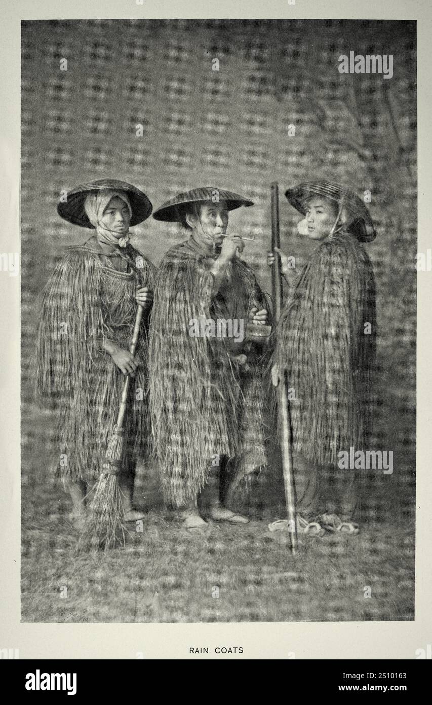 History of Japan, Japanesse men wearing traditional rain coats made of ...